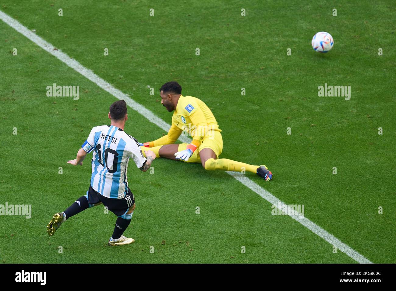 Lusail, Qatar. 22nd Nov, 2022. Lionel Messi (L) of Argentina scores a ...