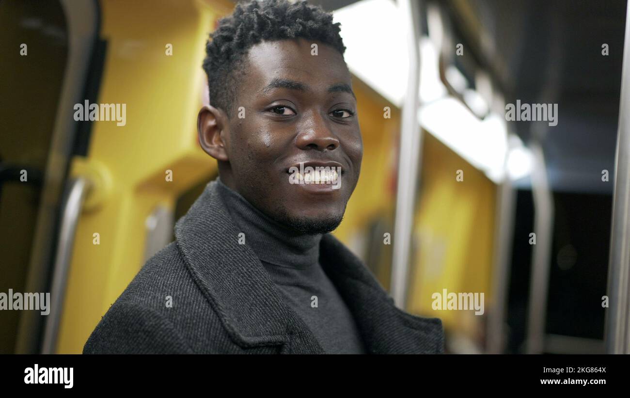 Portrait black man standing at metro subway commuting Stock Photo - Alamy