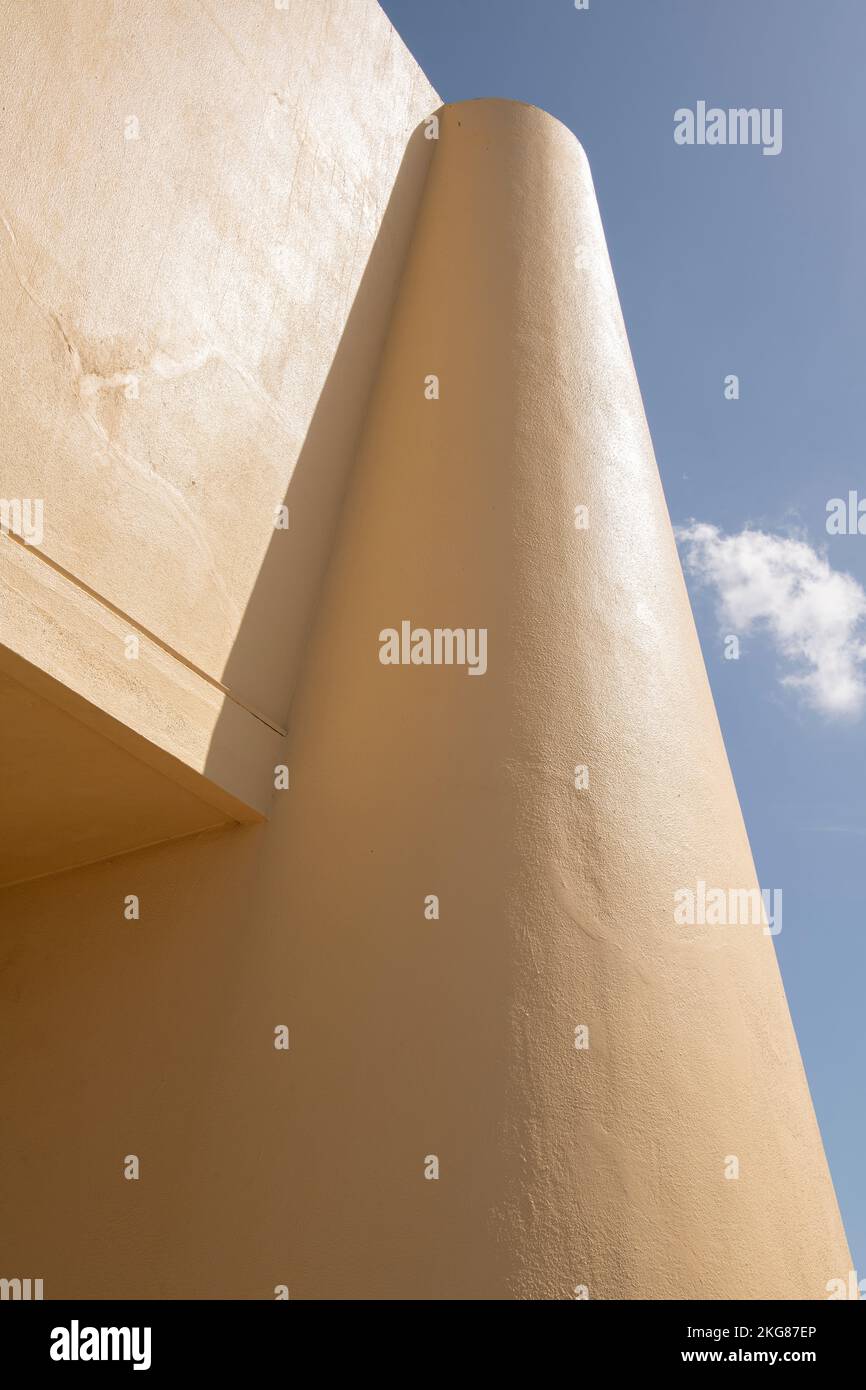 Facade of a corner of a castle with circular surfaces on a sunny day ...