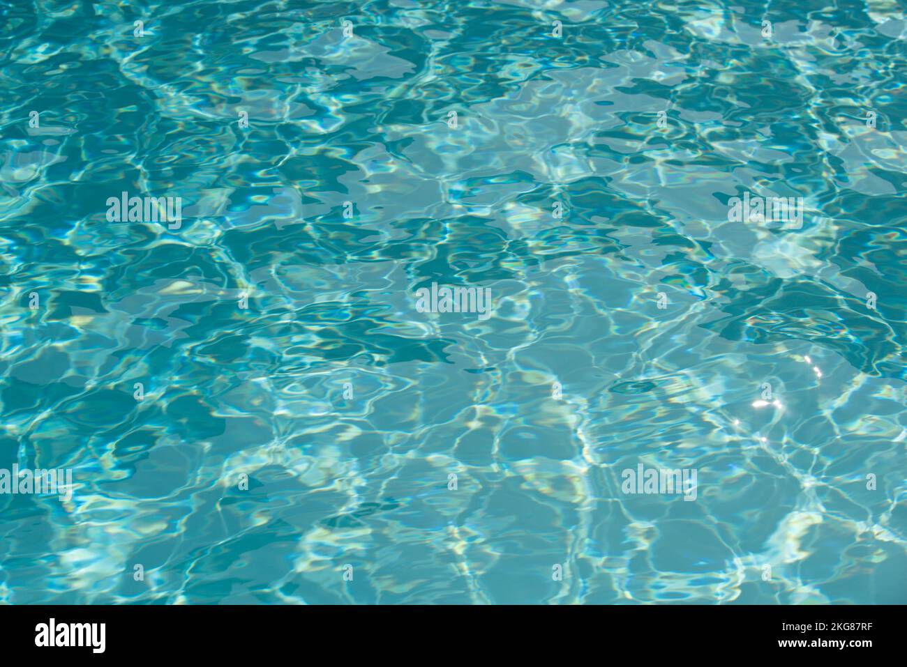 Ripple Water in swimming pool with sun reflection. Wavy water ...