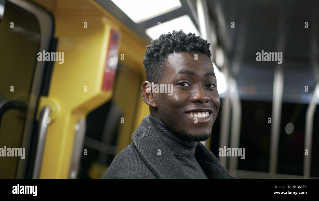 Portrait African man riding subway. Person commuting in underground ...