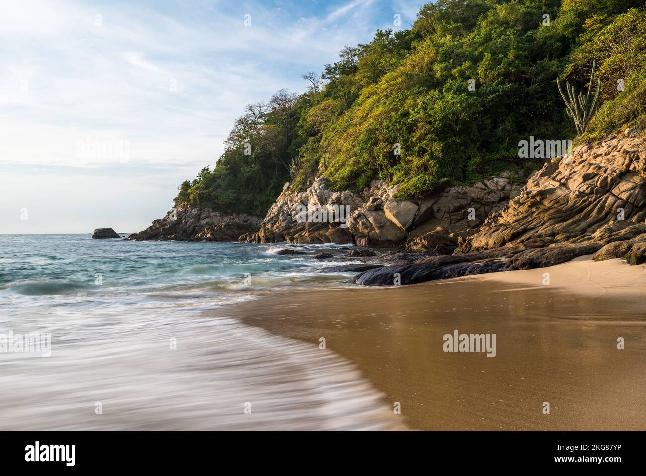 Waves coming ashore on Chahue Beach in the Bahias of Huatulco, Mexico ...
