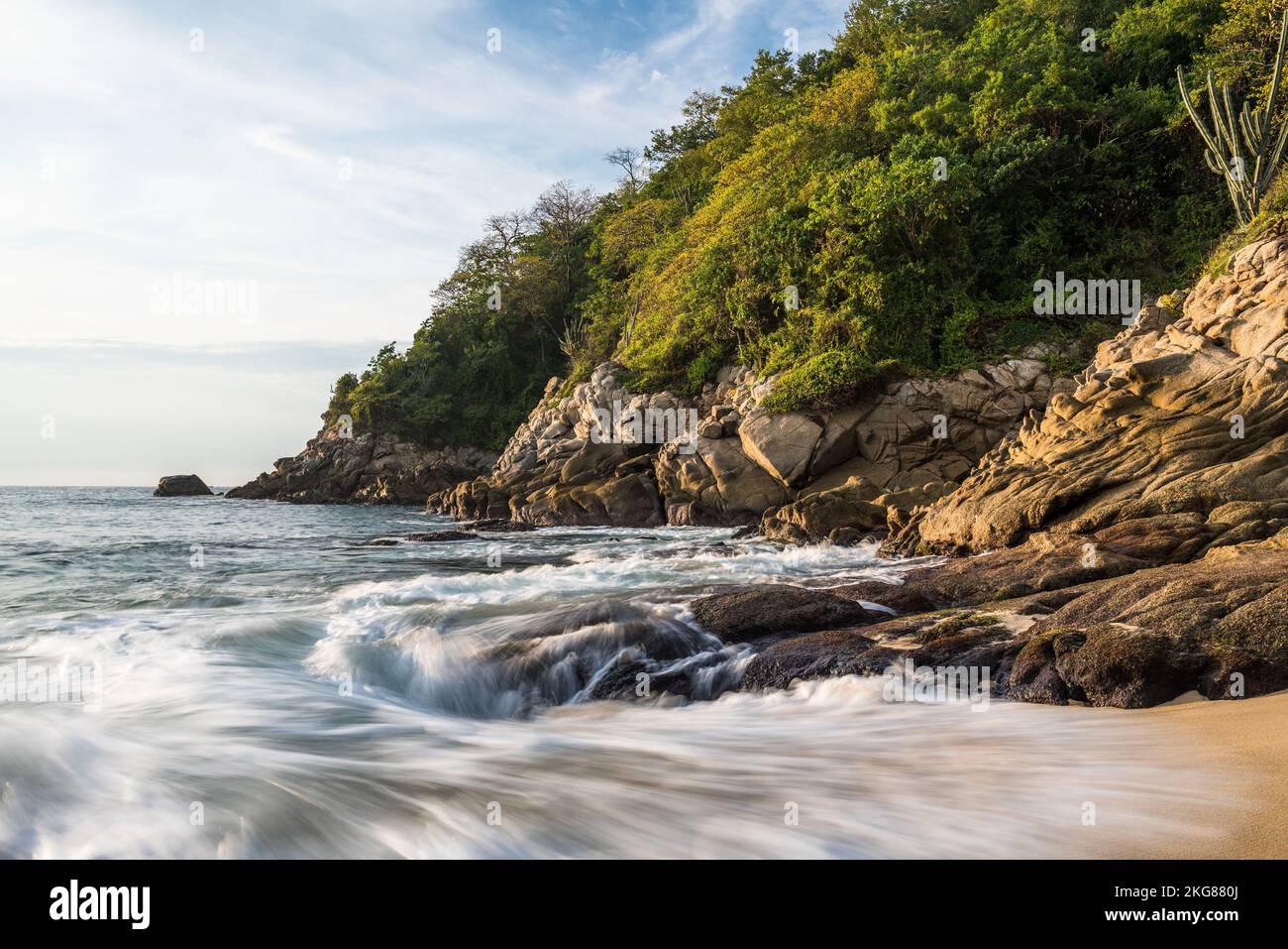 Waves coming ashore on Chahue Beach in the Bahias of Huatulco, Mexico ...