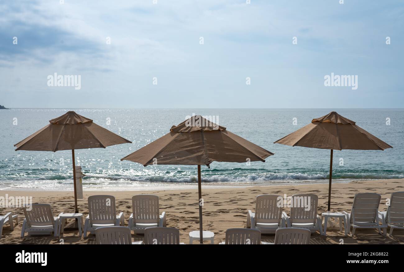 Beach umbrellas on Chahue Beach in the Bahias of Huatulco on the ...