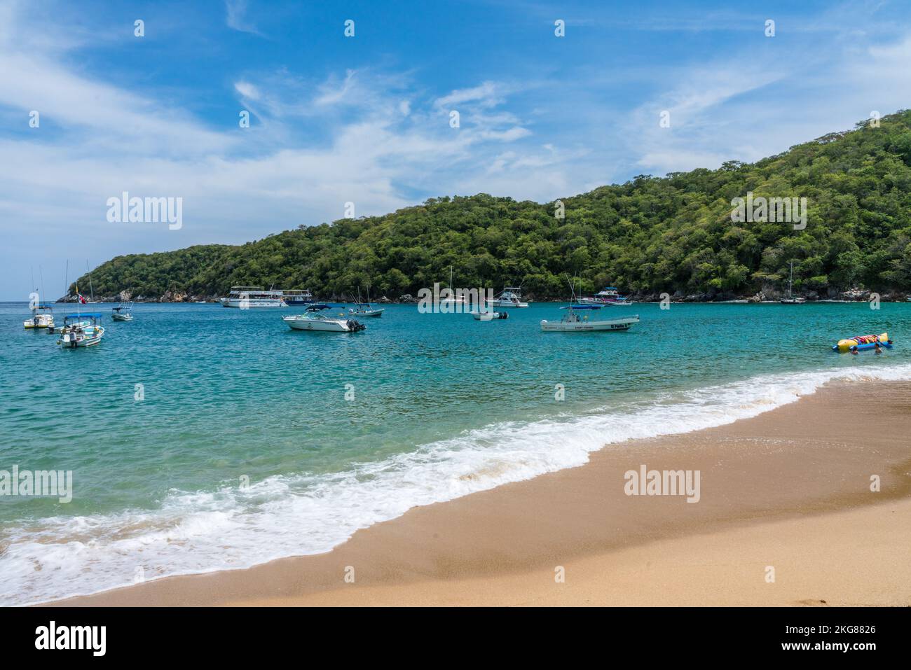 Recreational boats at Maguey Beach in Huatulco National Park on the ...