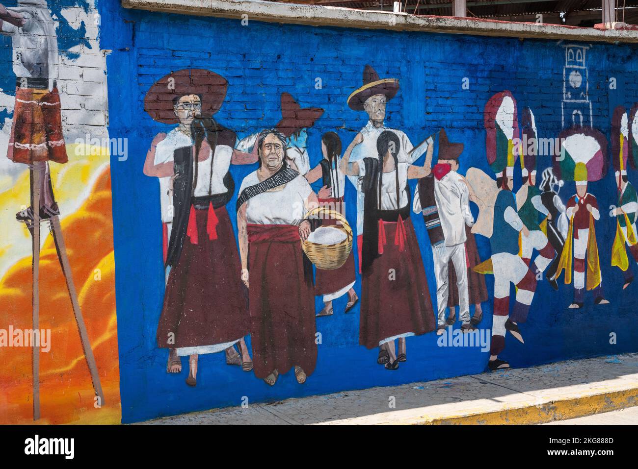 A colorfully painted mural on a wall in Zaachila, Mexico, near Oaxaca ...