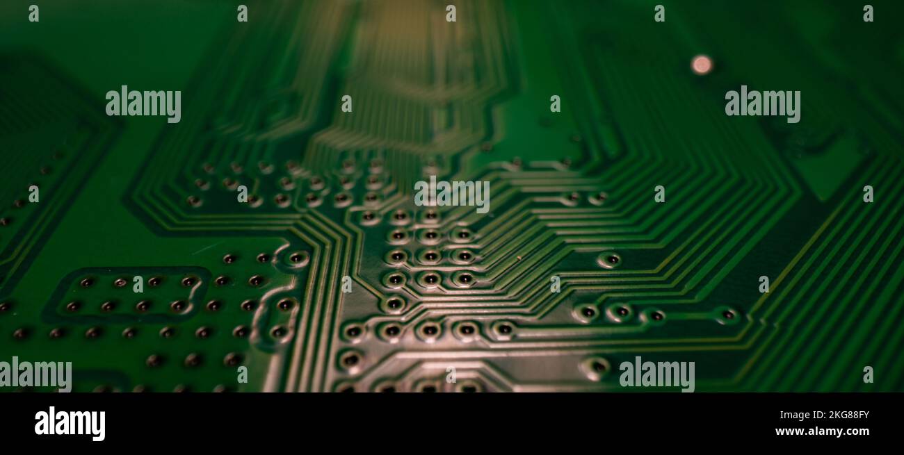 Technology background. High tech electronic circuit board background. Close-up macro electronic ...
