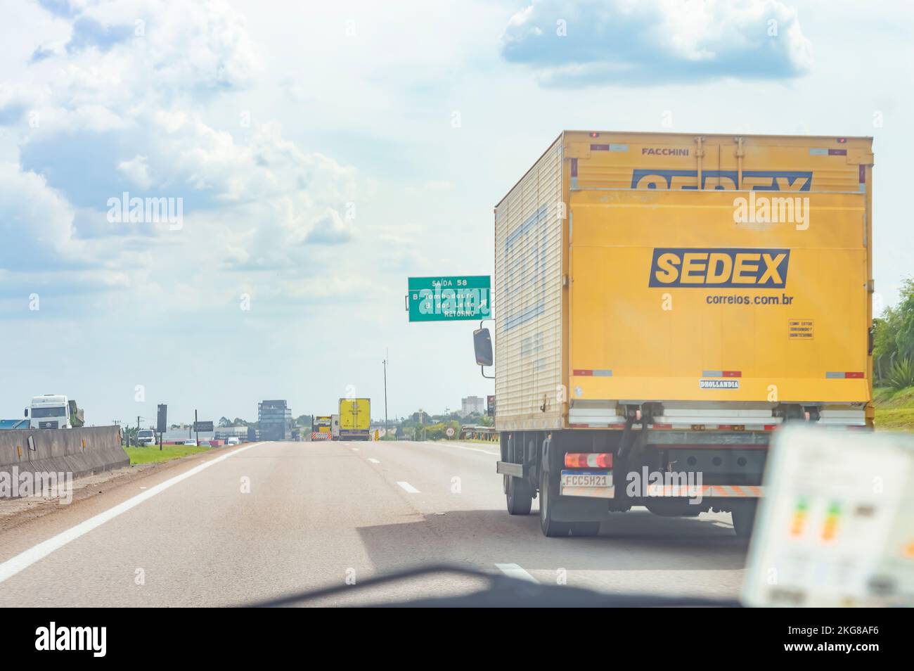 Campinas-sp,brasil-November 21,2022: view from inside a car showing the front of a sedex truck ...
