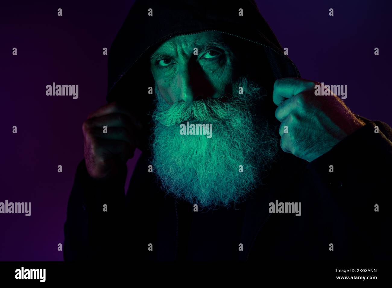 Close up photo of scary suspicious senior man negative character hold ...