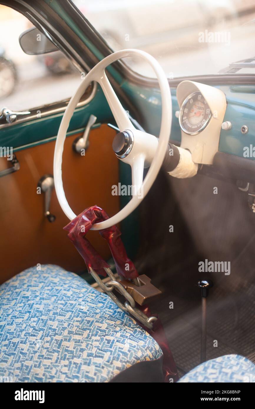 retro car with a beautiful design, the steering wheel is closed with an ...