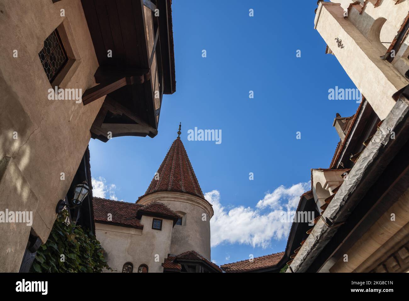 Tiled roofs of the internal buildings of Bran Castle with a weather ...