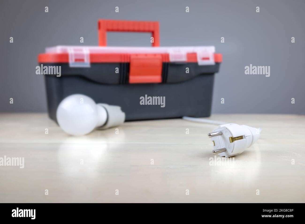 Installing a light bulb Stock Photo - Alamy