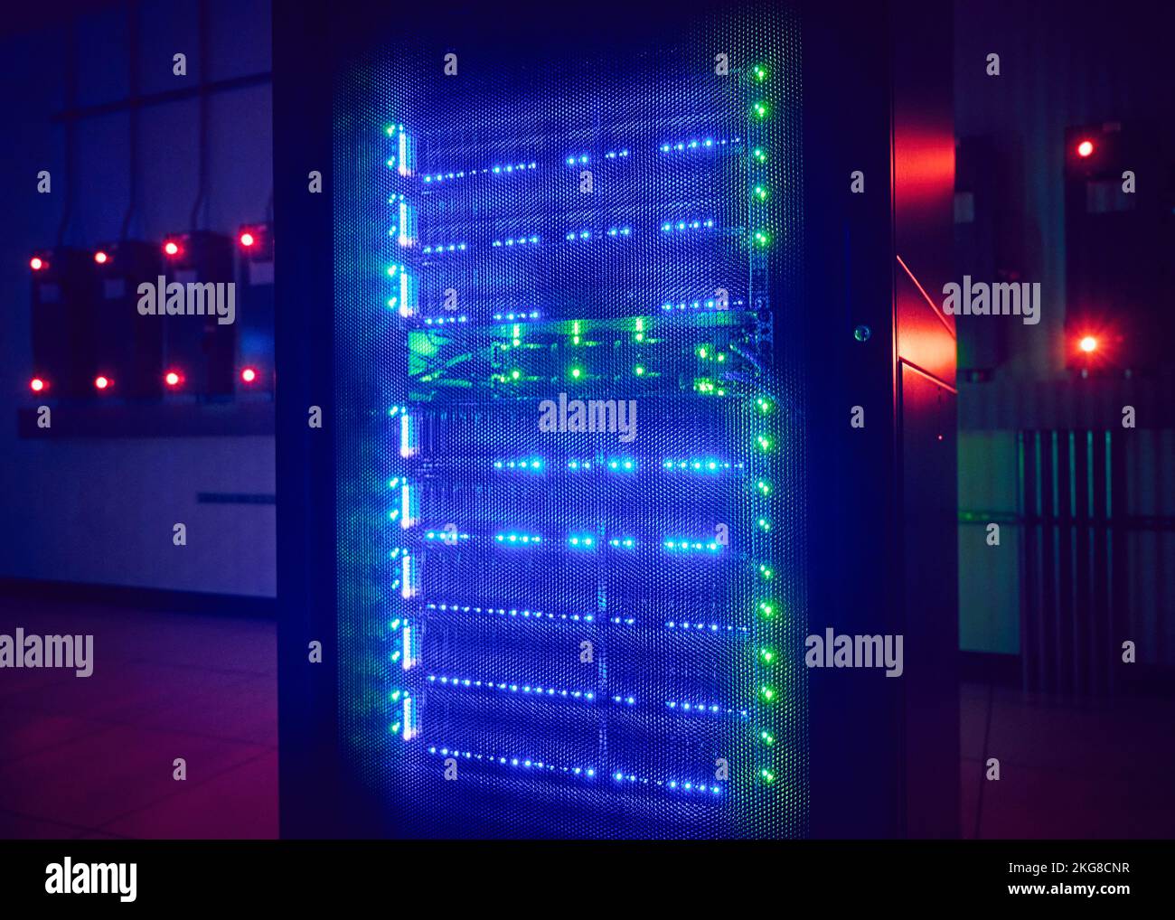 Glowing hard drives in dark server room Stock Photo - Alamy
