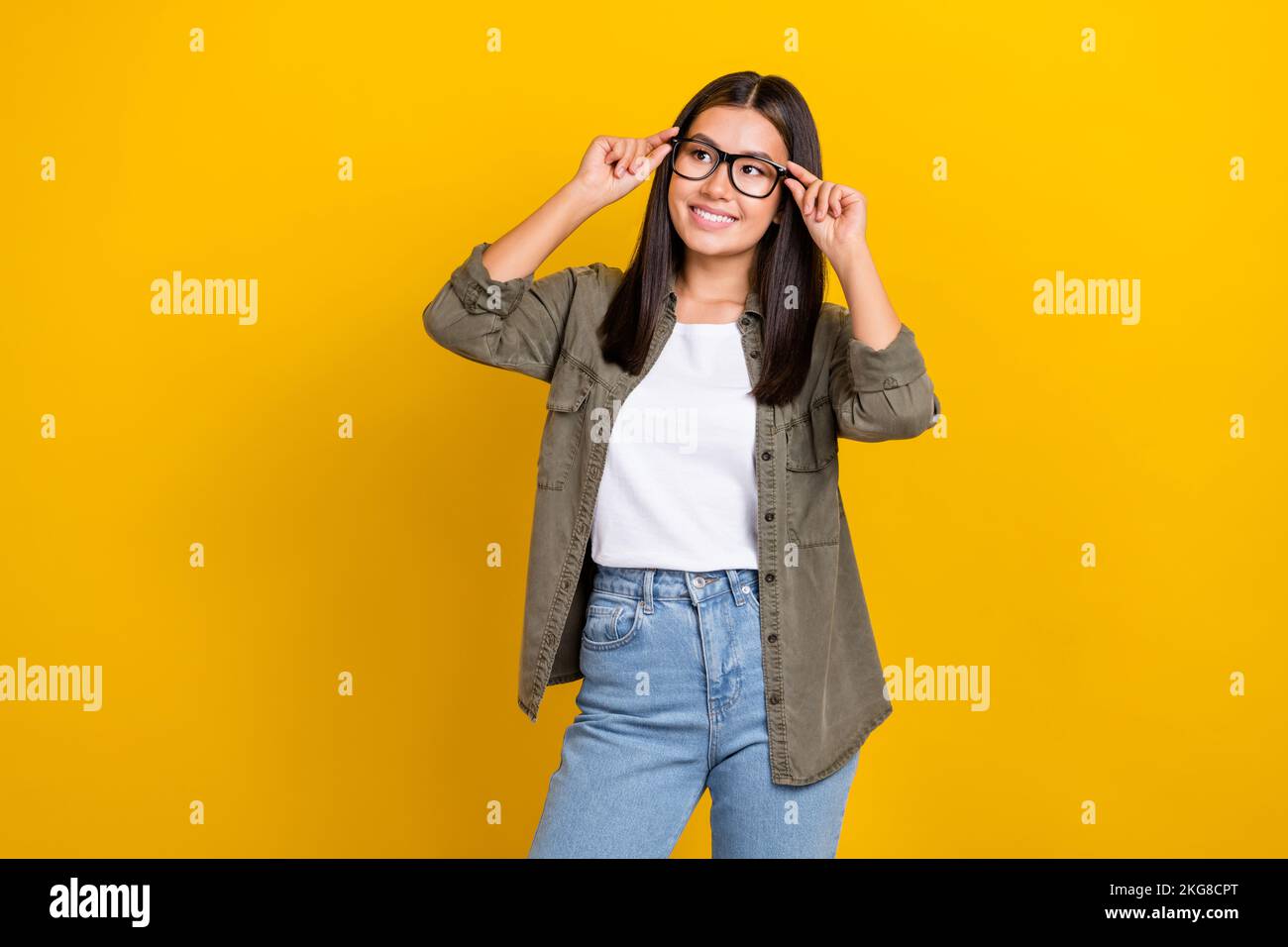 Photo of good mood girl with brunette hair wear gray shirt hands ...