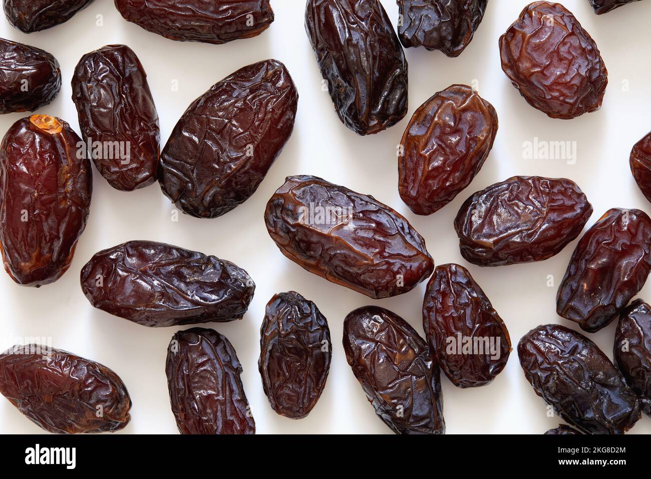 Fresh dried dates on white background Stock Photo - Alamy