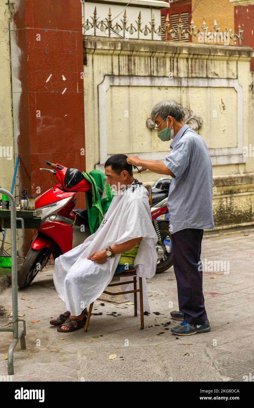 Hanoi vietnam street barber in hi-res stock photography and images - Alamy