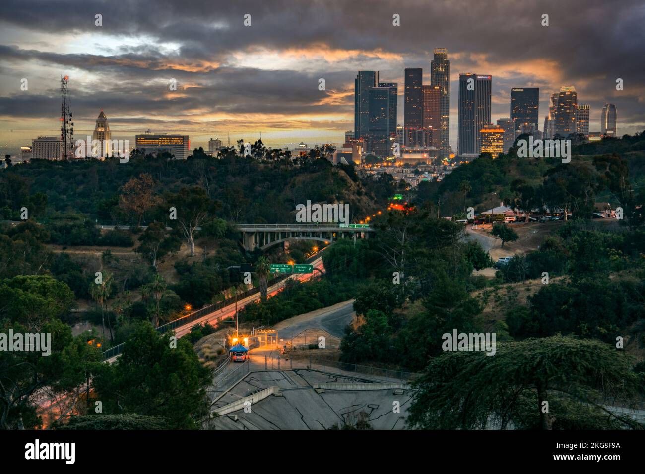 The Los Angeles city lights with highways leading to skyscrapers ...