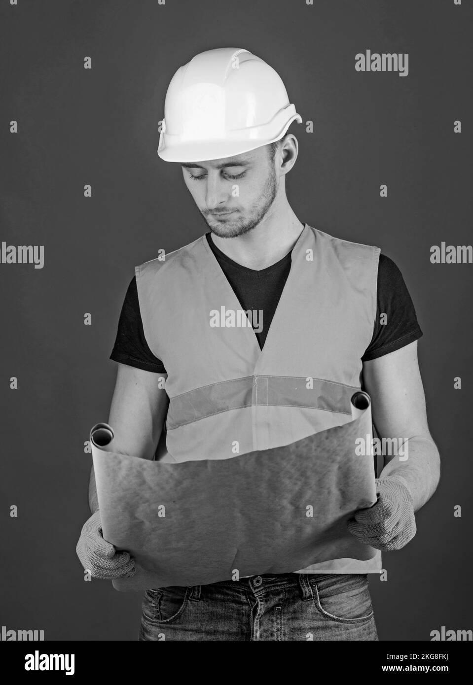 Engineer, architect, labourer, builder on strict face holds old ...