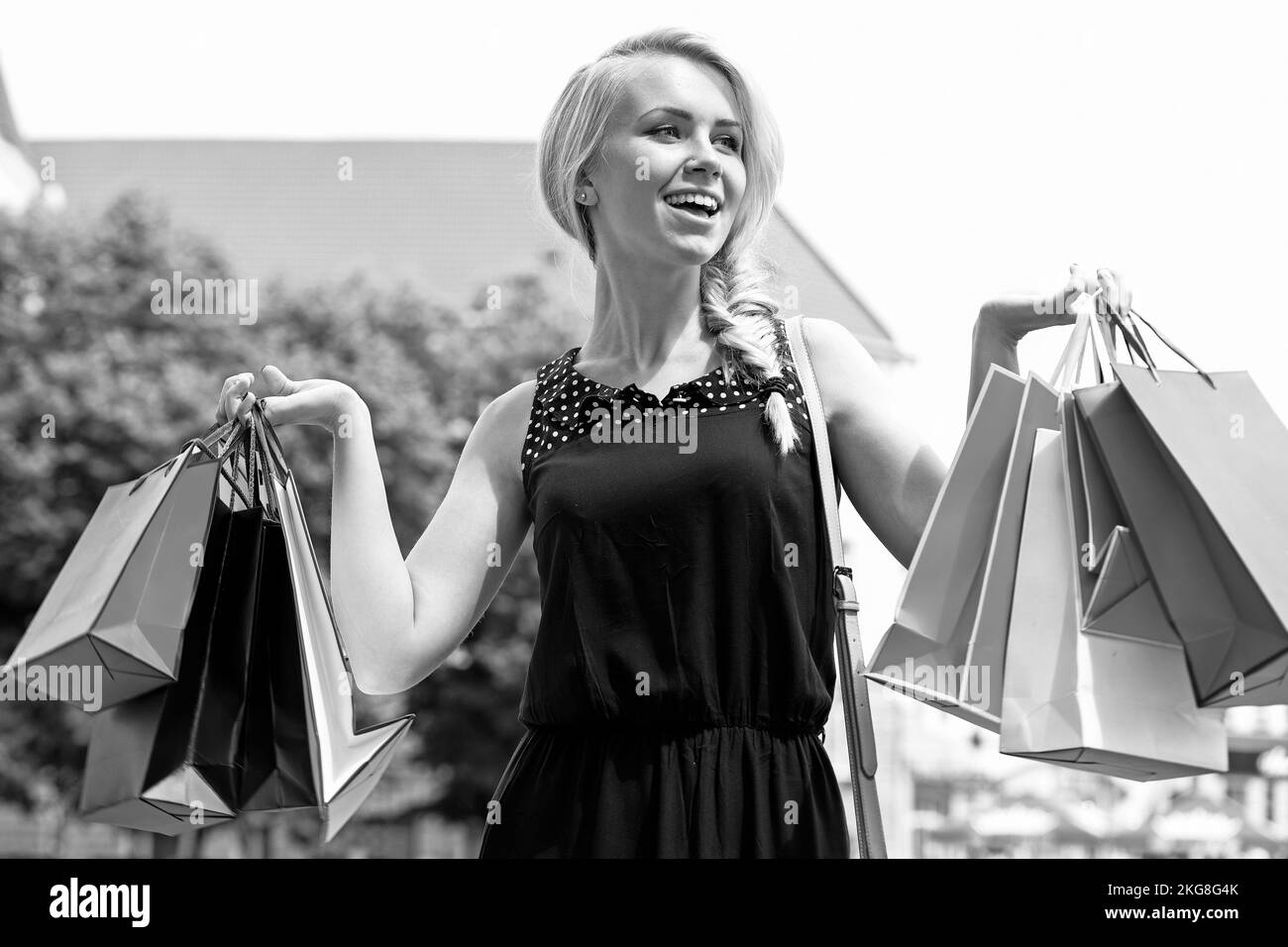 Lady sale bags Black and White Stock Photos & Images - Alamy