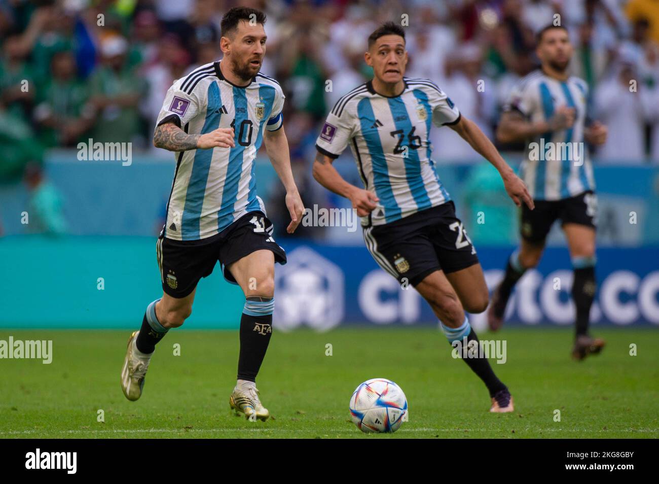 Lionel Messi of Argentina and Nahuel Molina of Argentina during the ...