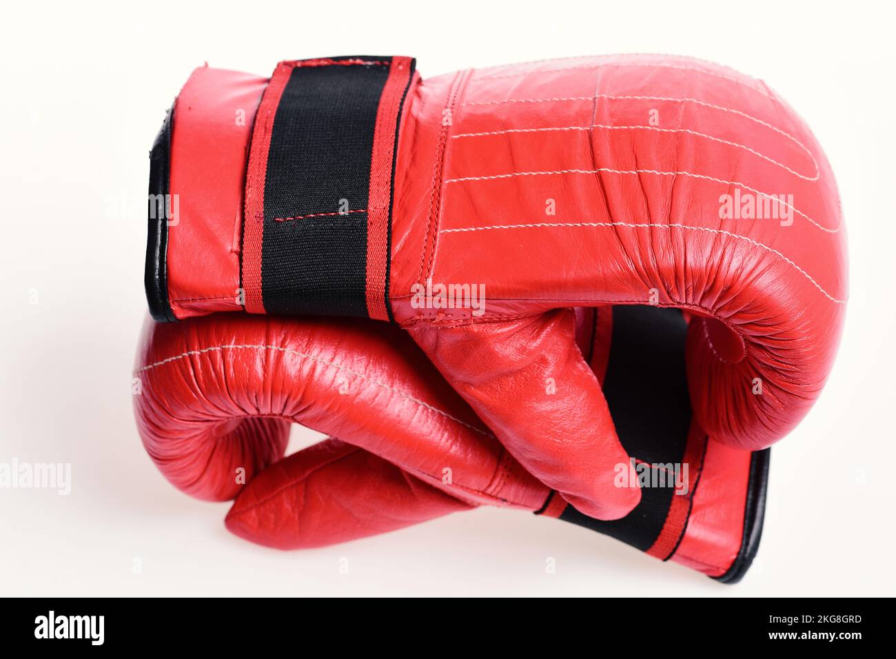 Combat and fight concept. Pair of boxing gloves lying on each other ...