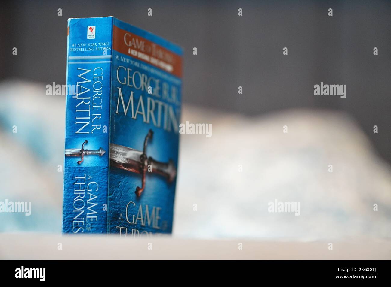 A close-up of George R. R. Martin Game Of Thrones fantasy novel on a ...