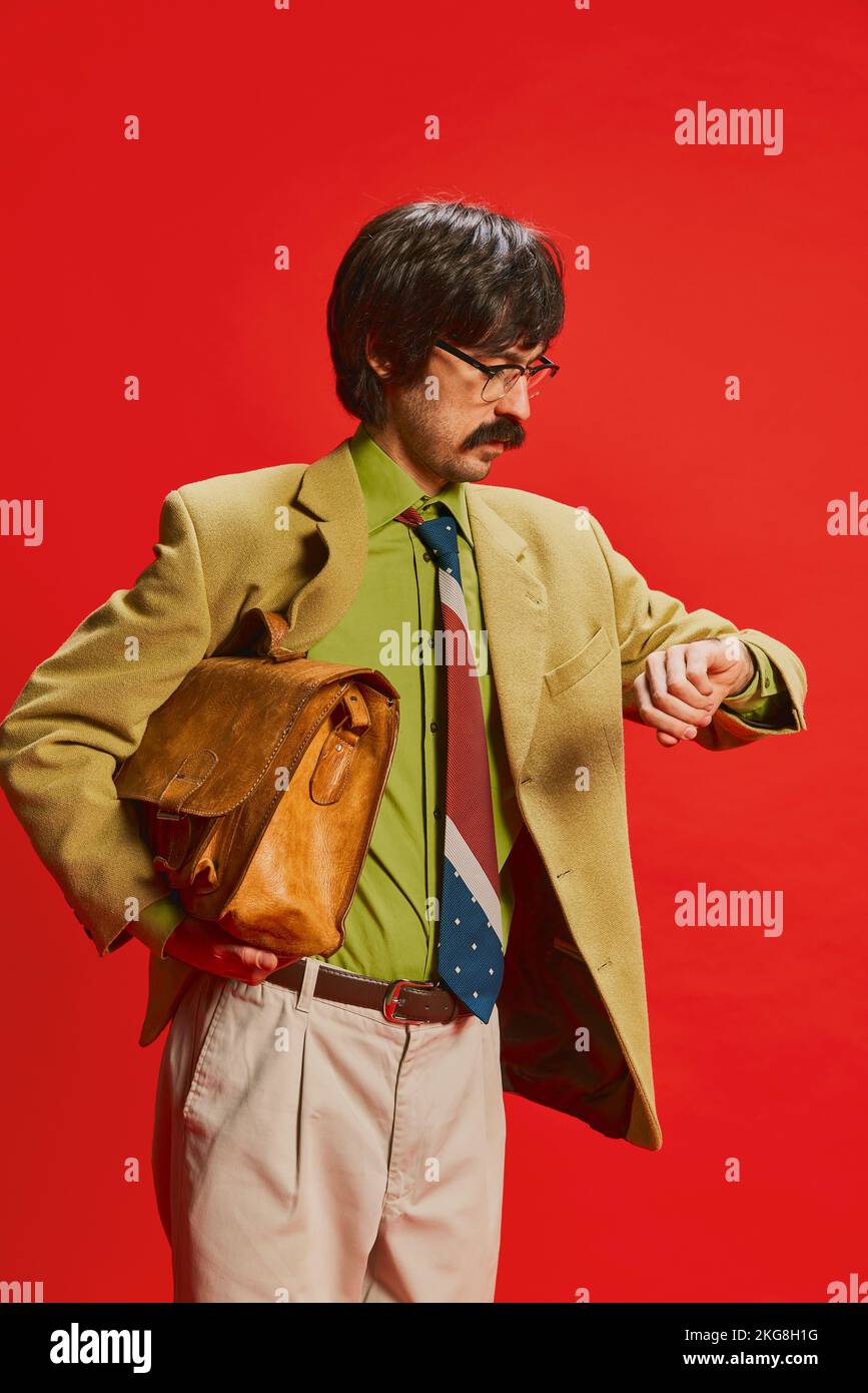 Portrait of stylish man with moustache posing in vintage suit isolated ...