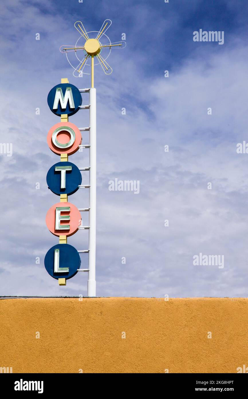 Vintage motel sign against sky Stock Photo - Alamy