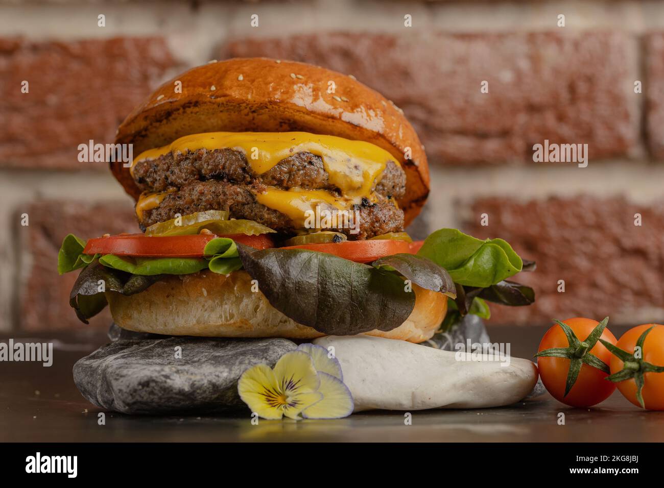 cheese burger on table Stock Photo - Alamy