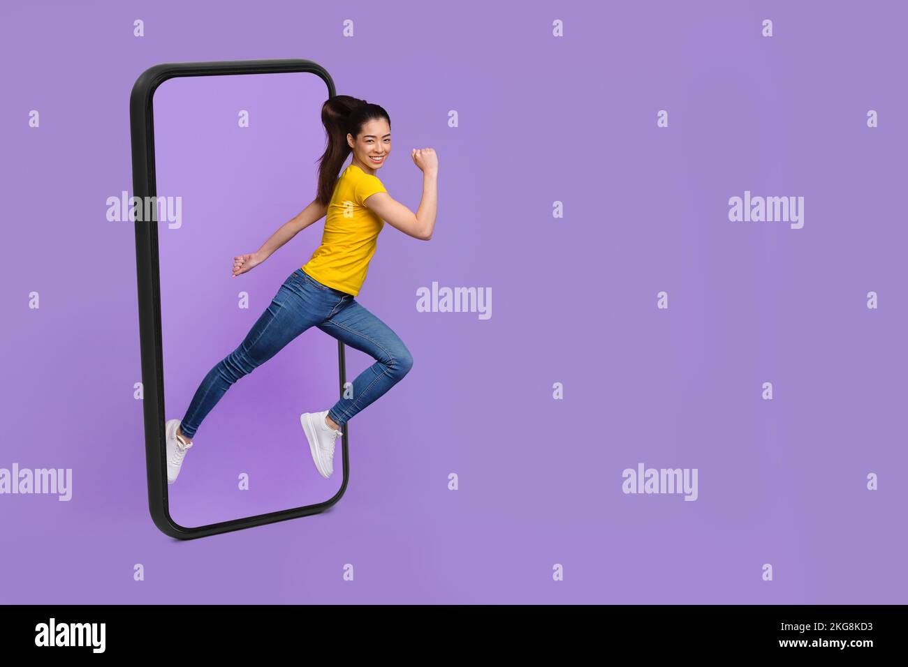 Glad excited pretty millennial asian lady jumping out of huge ...