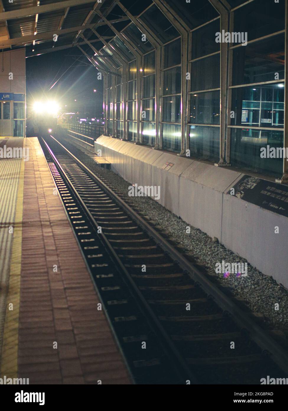 Train coming to the Station Stock Photo - Alamy