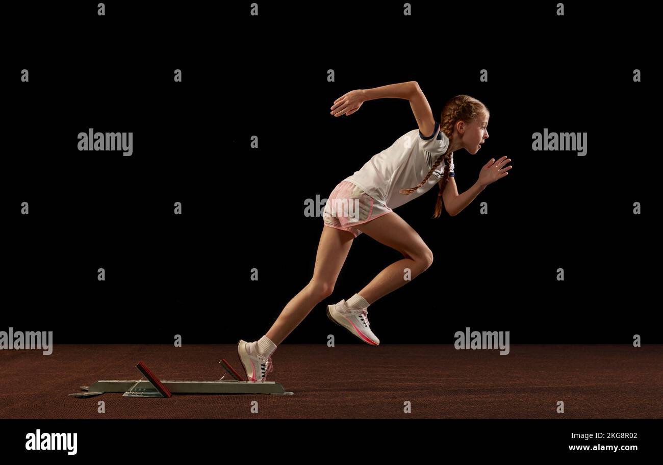 Focus on movement. Portrait of begginer athlete, runner training ...