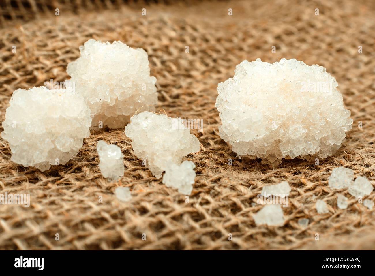 Sea salt lies on the fabric. Sea salt granules close up Stock Photo - Alamy