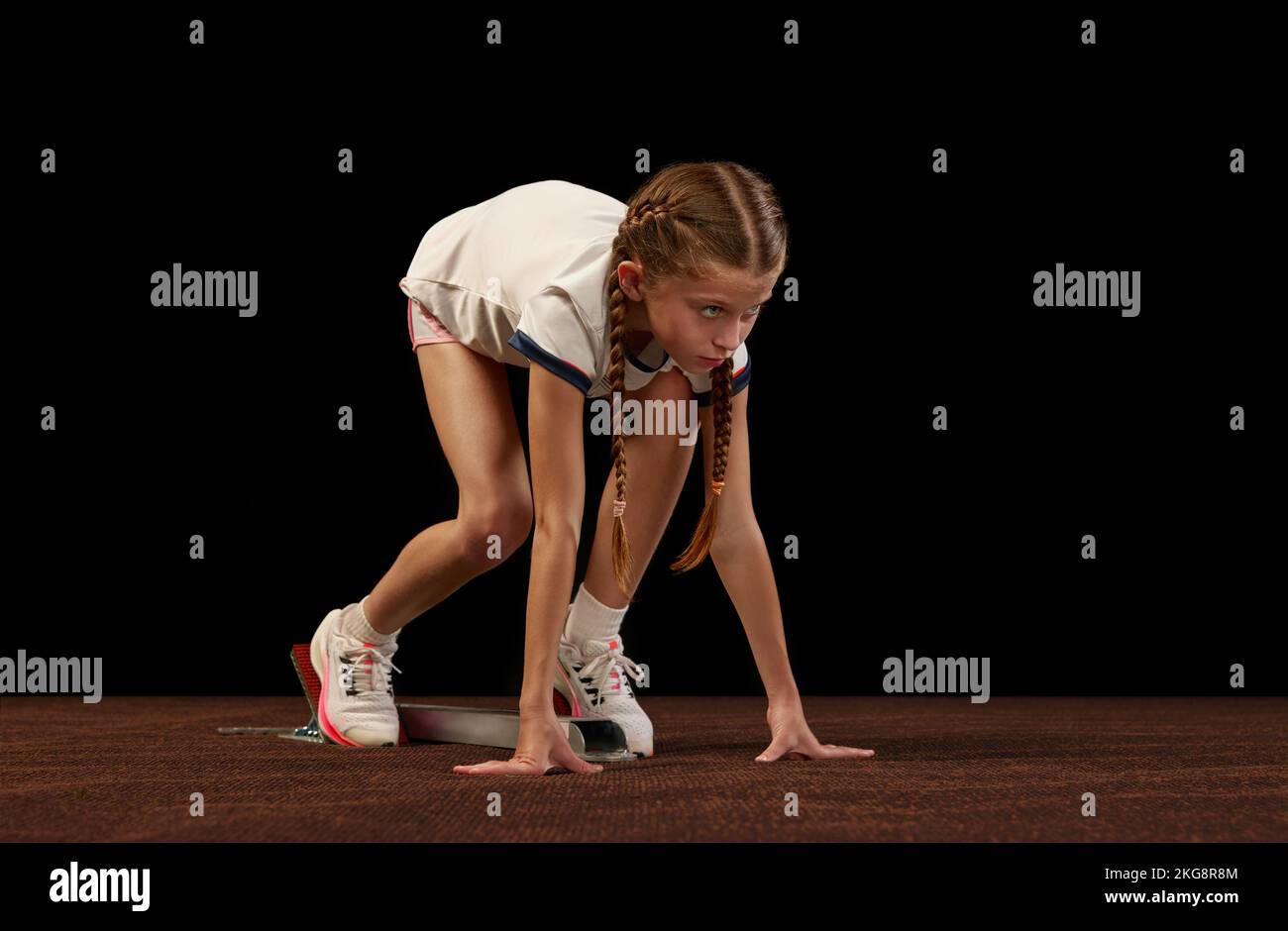 At start line. Portrait of begginer athlete, runner training isolated ...