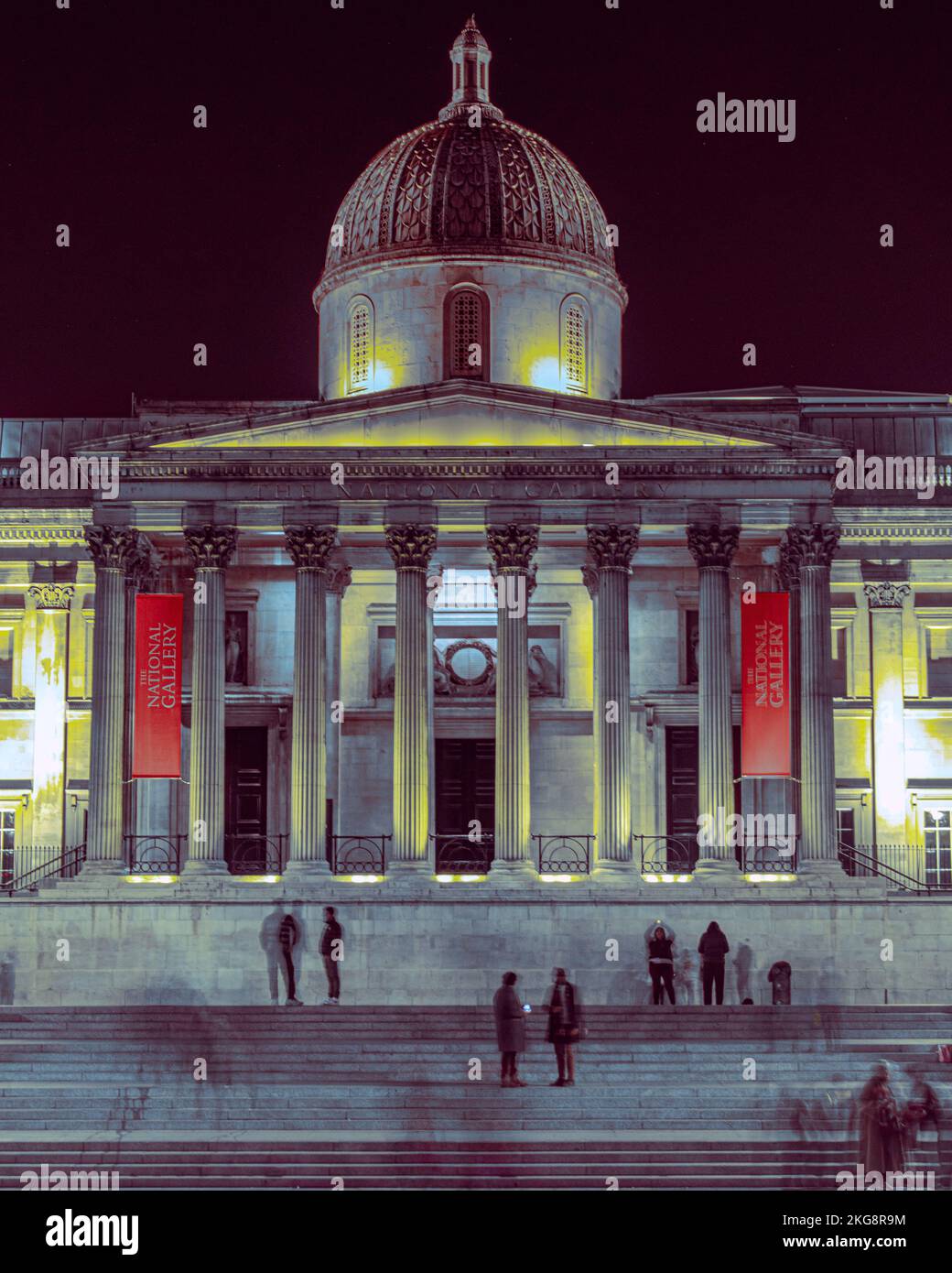 A long exposure shot of the National Gallery, London, showing figures ...