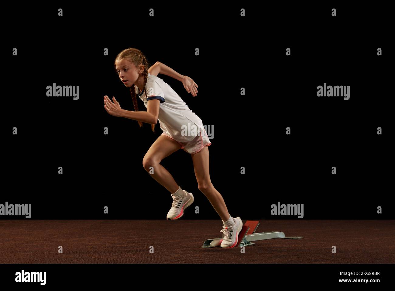 Focus on movement. Portrait of begginer athlete, runner training ...