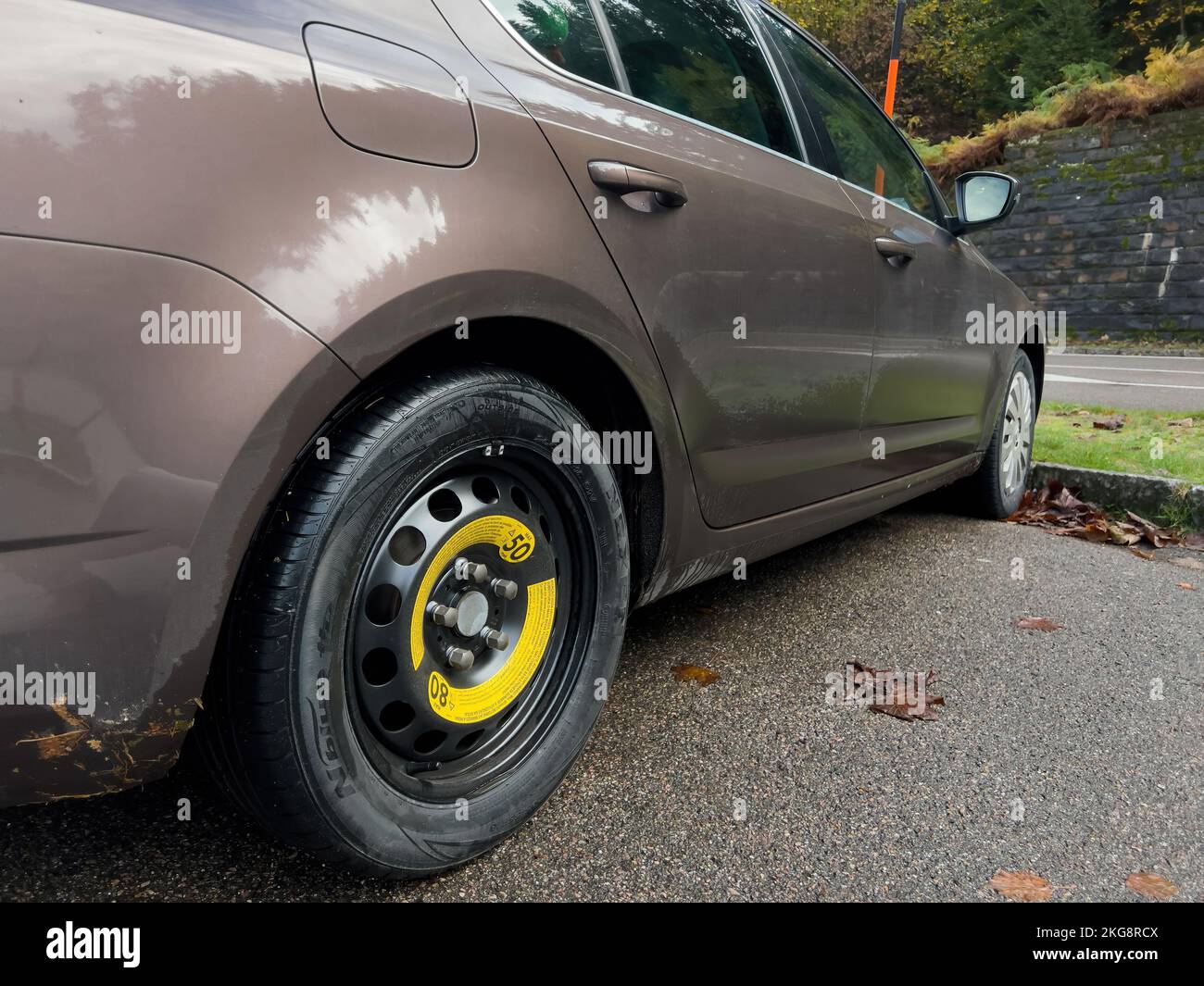 Paris, France - Oct 2, 2022: Side view of Skoda Octavia brown car with ...