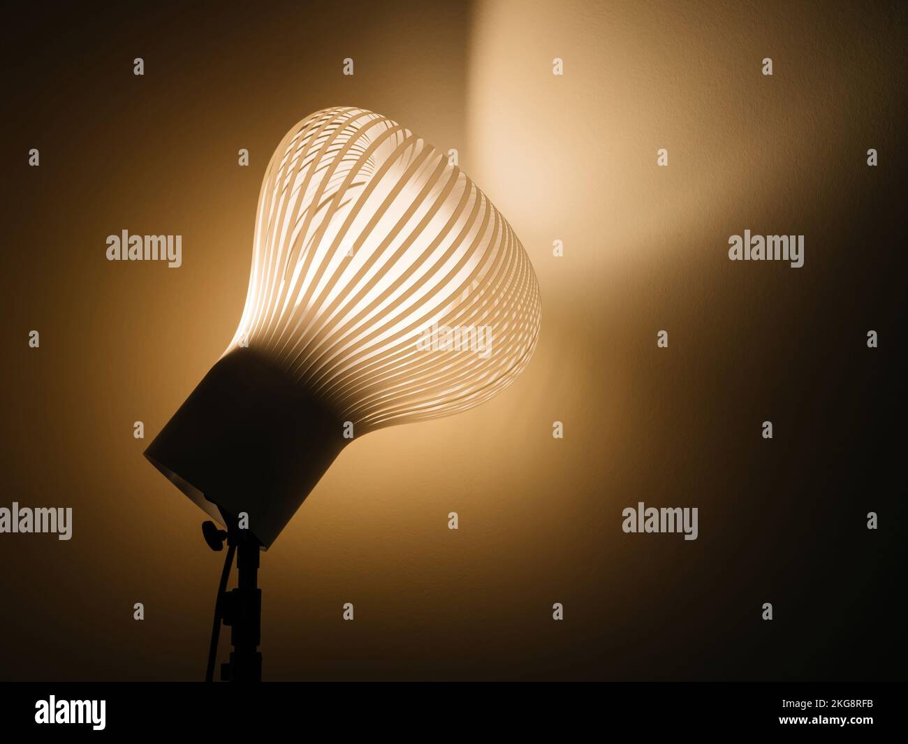 High-end light illuminated a wall - warm tones Stock Photo - Alamy