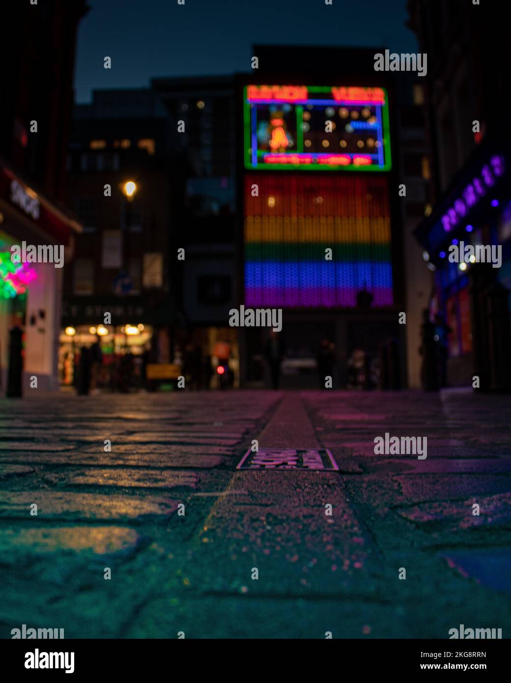 A shallow depth ion field shot of the Raymond's Revue neon sign in Soho ...
