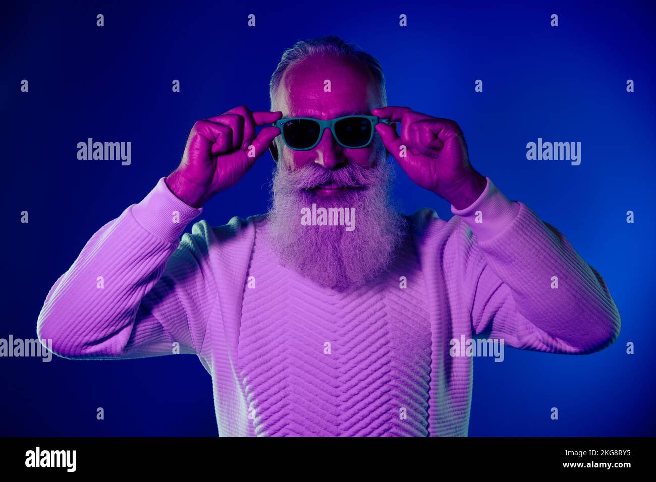 Photo of funny positive senior guy wear white hoodie arms glasses ...