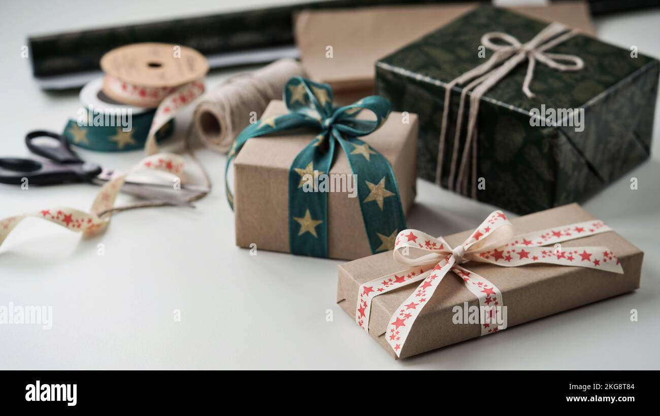 Gift boxes tied with beautiful ribbons with pattern stars with bow ...