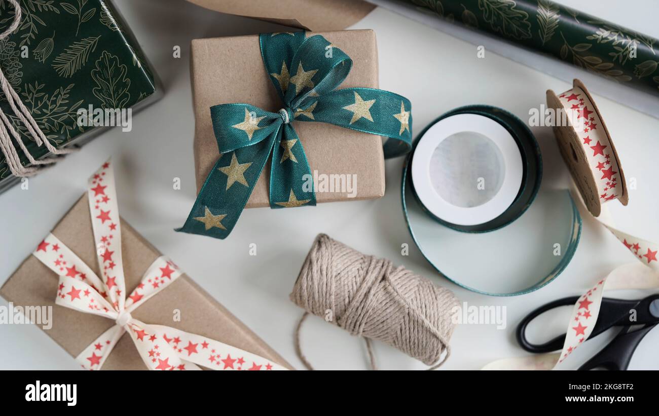 Gift boxes tied with beautiful ribbons with pattern stars with bow ...