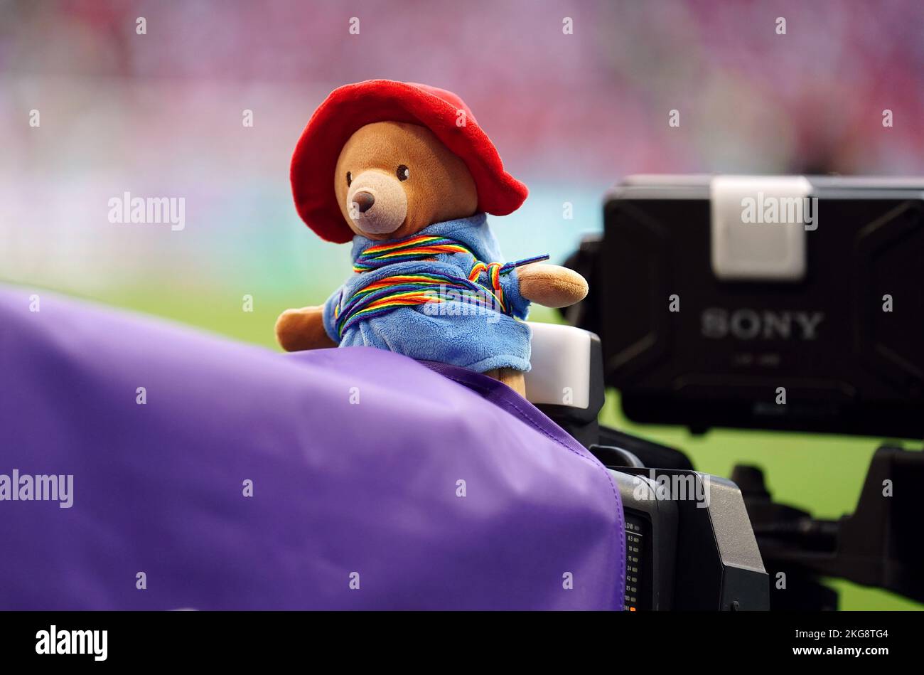 A teddy bear wearing rainbow laces on top of a television camera during ...