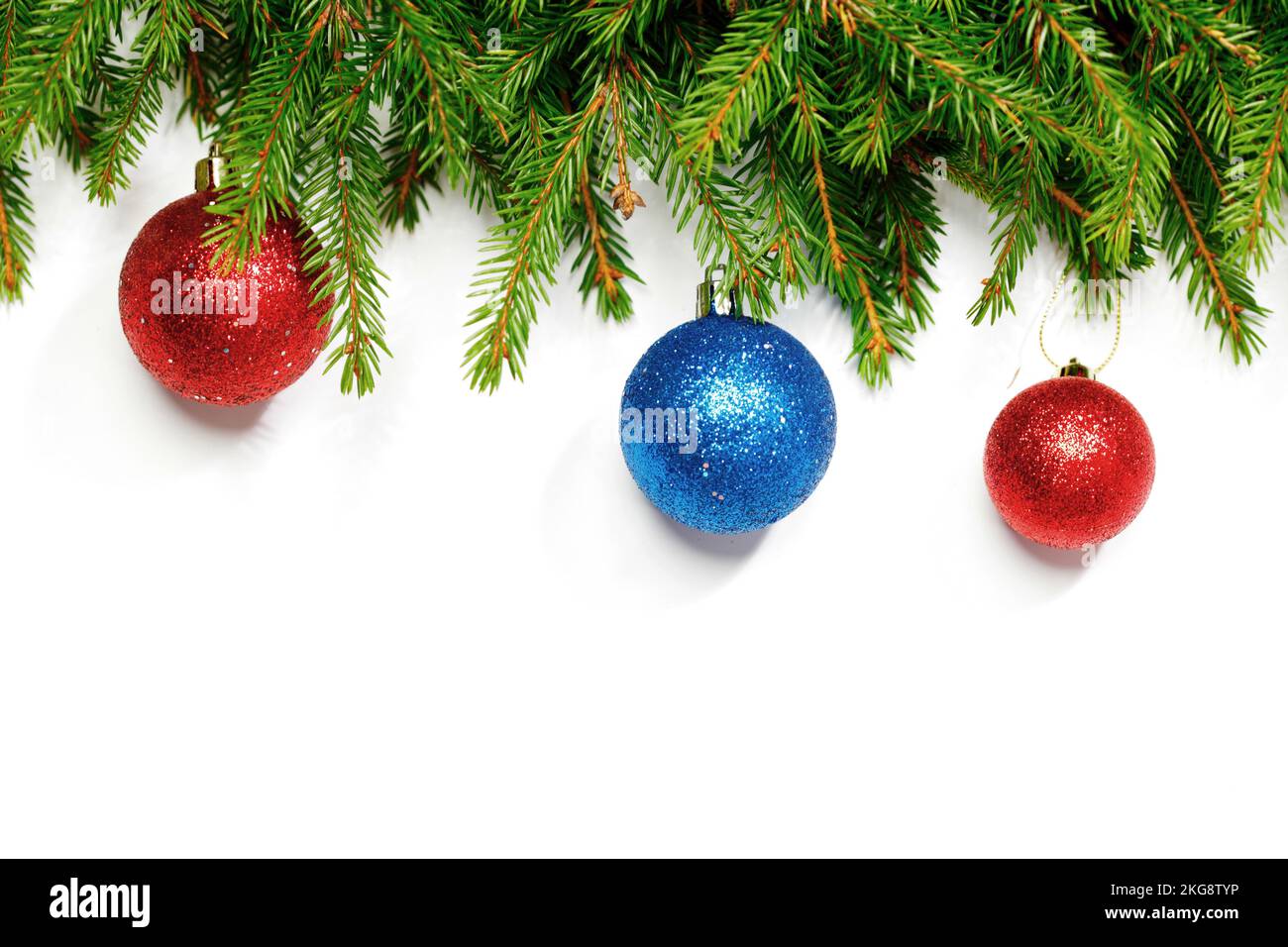 Baubles on fir branch isolated on white background Stock Photo - Alamy