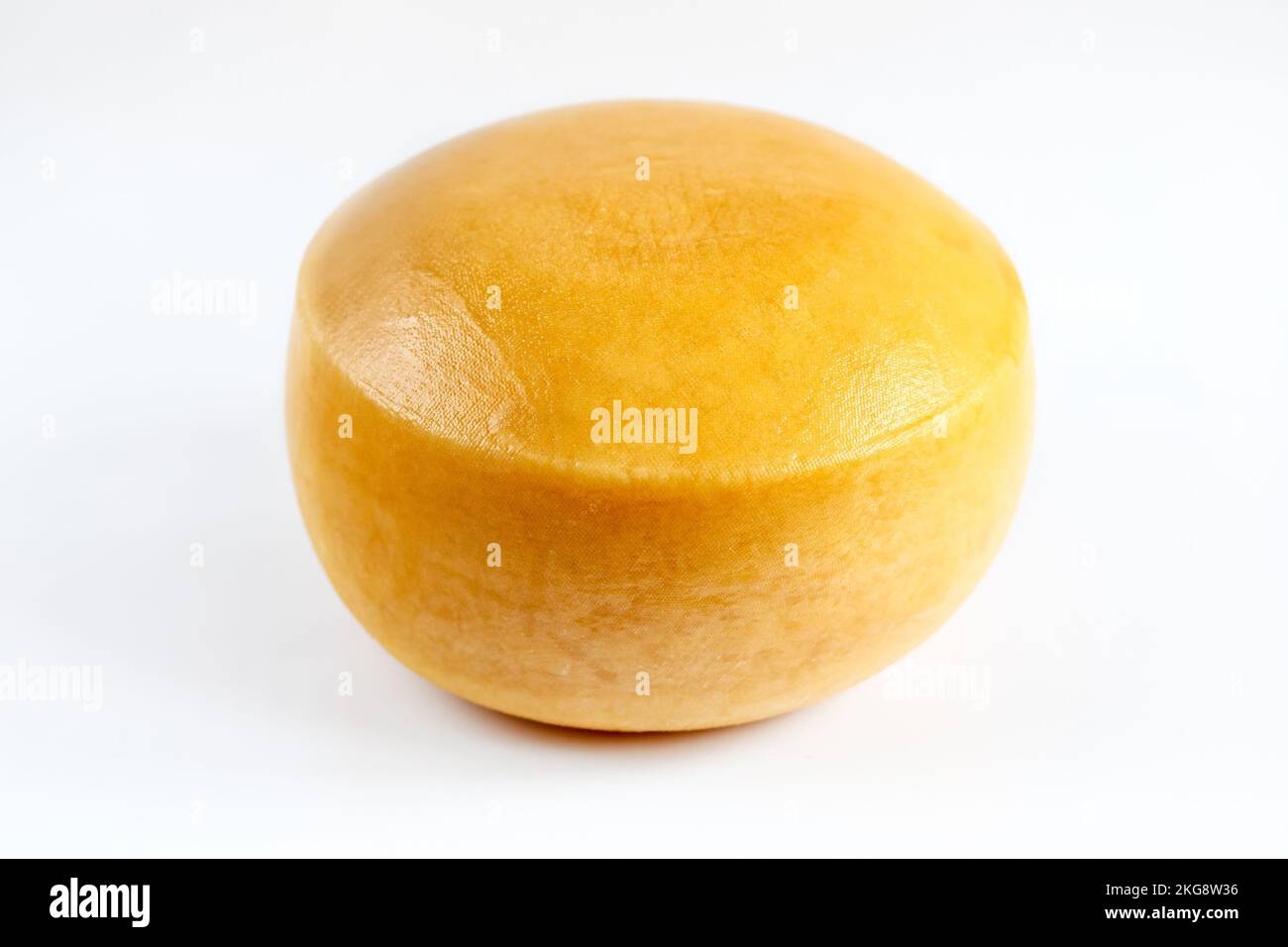 Cheese - yellow round cheese isolated on white background Stock Photo ...