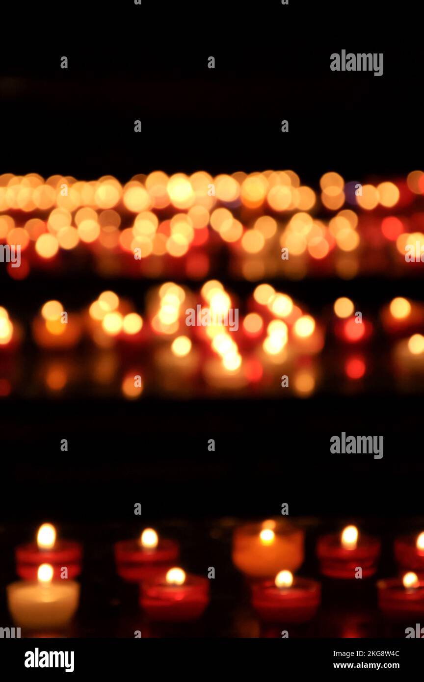 Blurry candles in church. Bokeh Stock Photo - Alamy