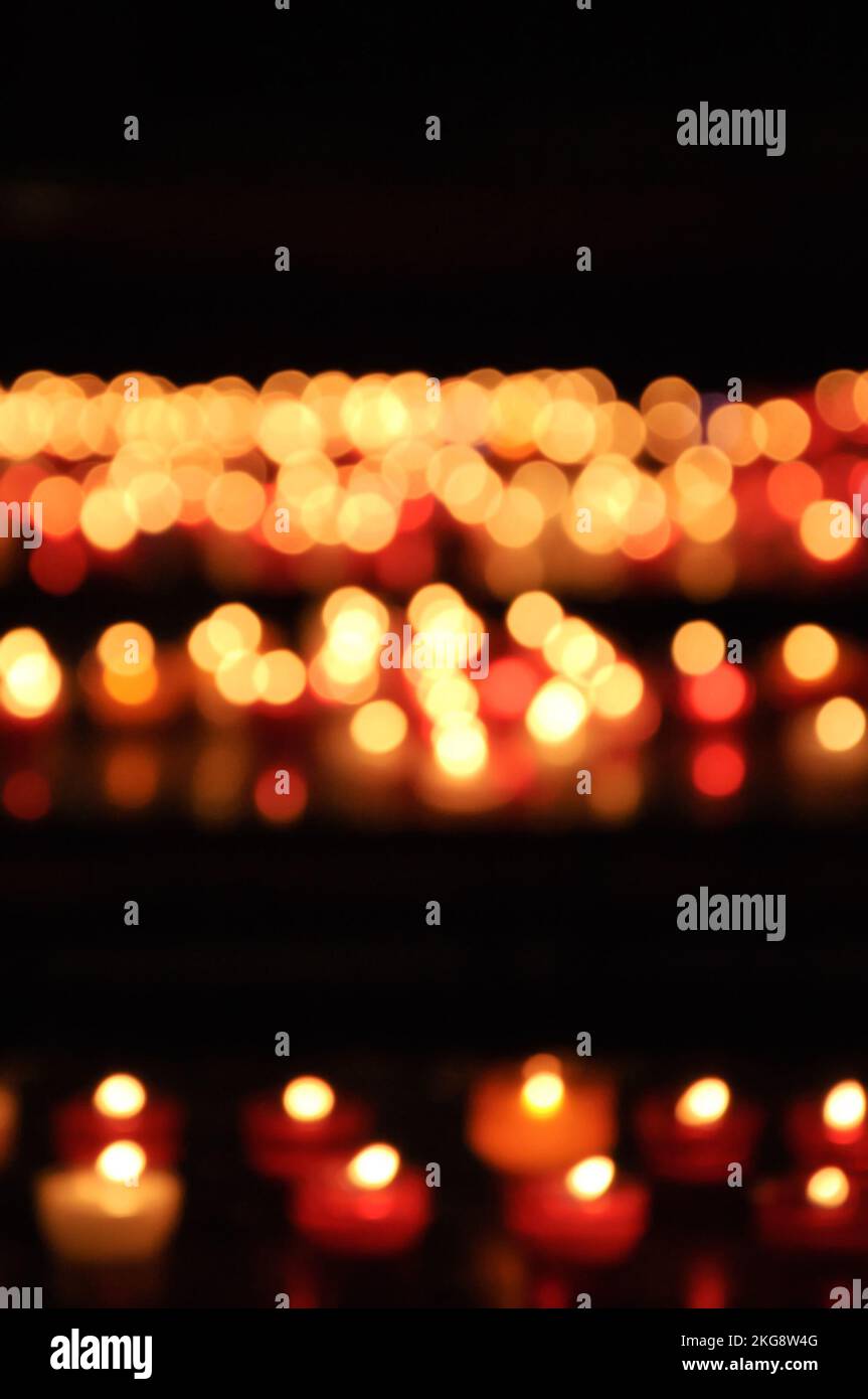 Blurry candles in church. Bokeh Stock Photo - Alamy