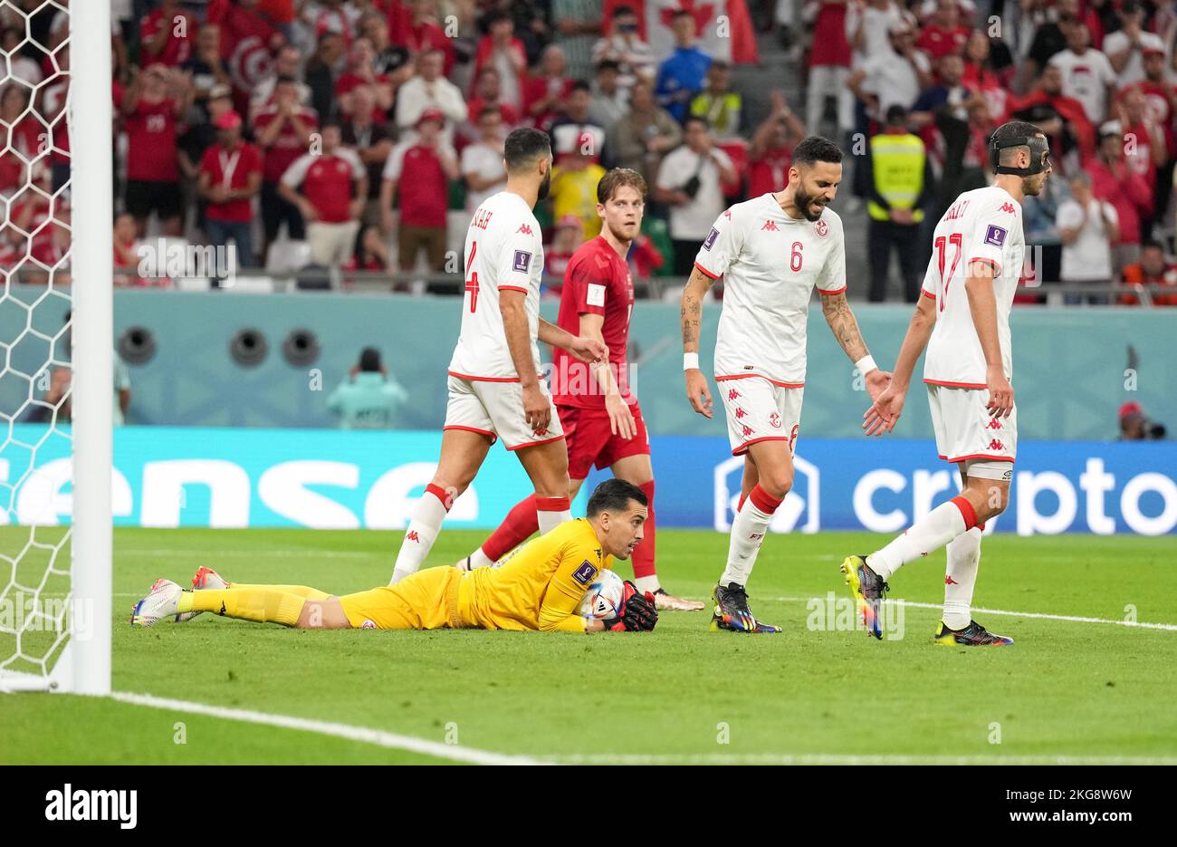 Al Rayyan, Qatar. 22nd Nov, 2022. Aymen Dahmen (bottom), goalkeeper of ...