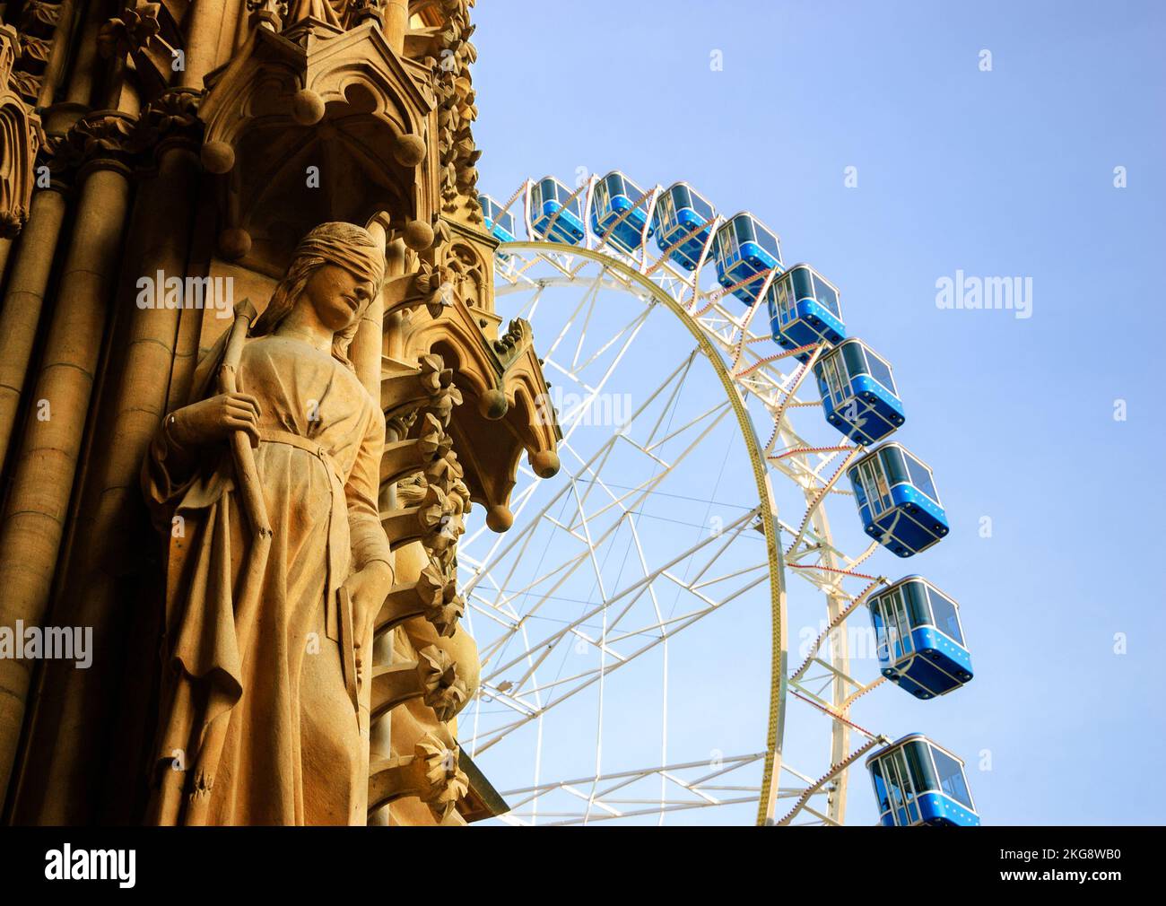 Christmas Ferris wheel in front of the cathedral of Metz ...
