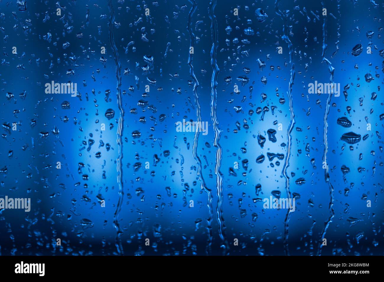 Detail of water drops from rain running down window rainy day Stock ...